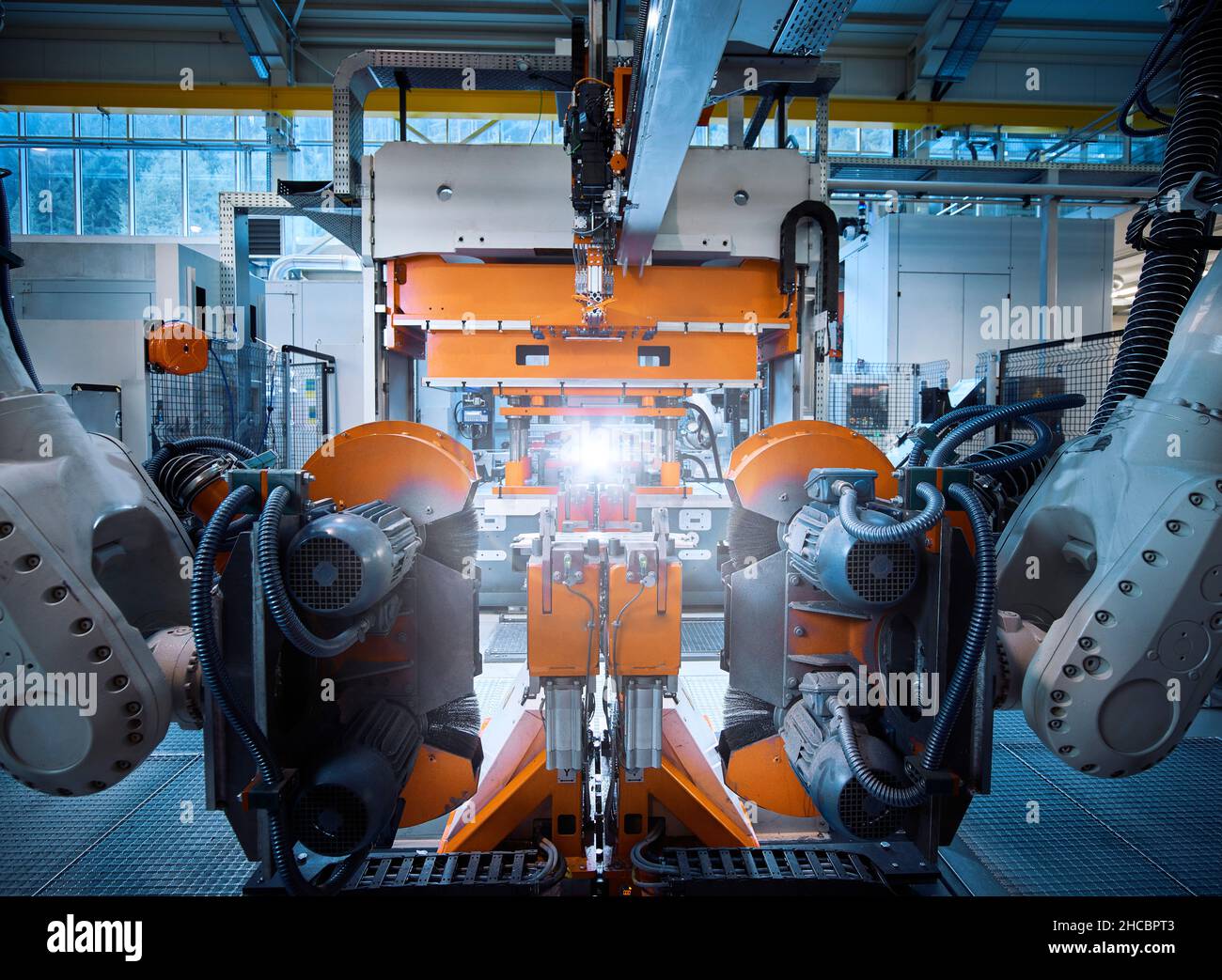 Robotic arms operating inside modern factory Stock Photo - Alamy Robotic arms operating inside modern factory Stock Photo - Alamy