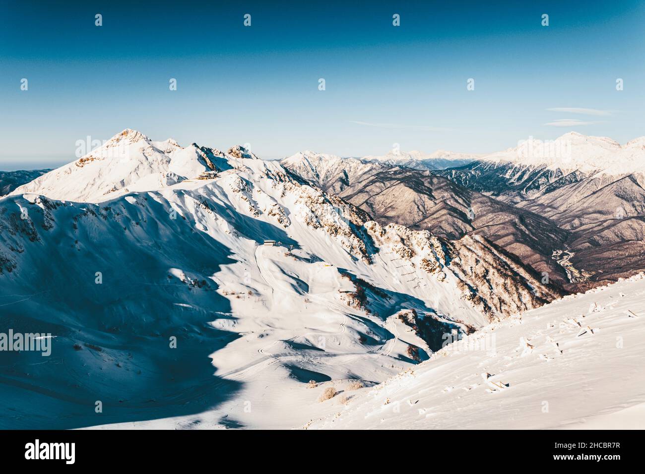 Snowcapped peaks of Aibga Ridge Stock Photo - Alamy