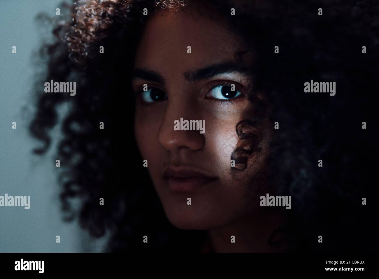 Women dark curly hair hi-res stock photography and images - Alamy