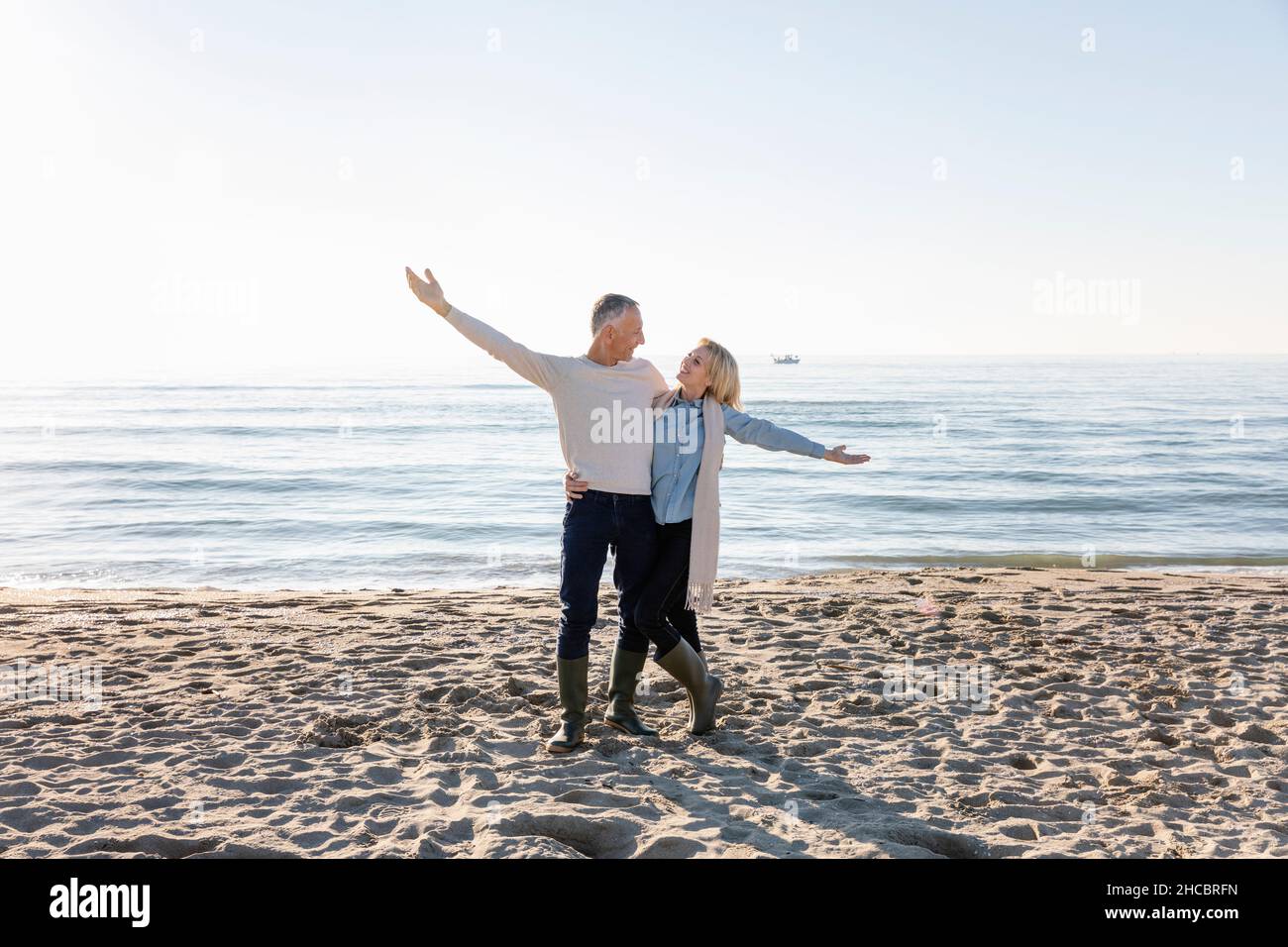 Man outstretched arm standing hi-res stock photography and images - Alamy