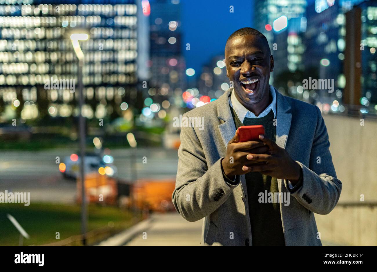 Businessman using smartphone night city hi-res stock photography and ...