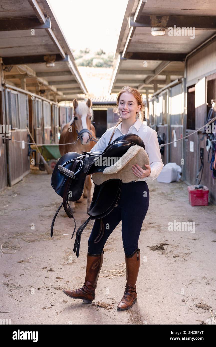 Stable saddle hi-res stock photography and images - Alamy