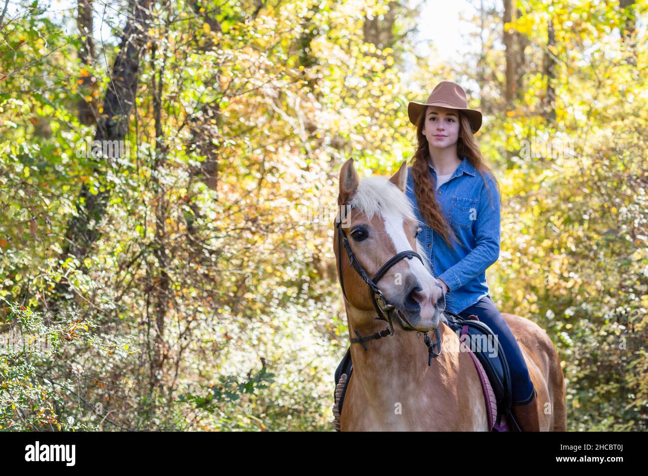Woman riding hat hi-res stock photography and images - Alamy