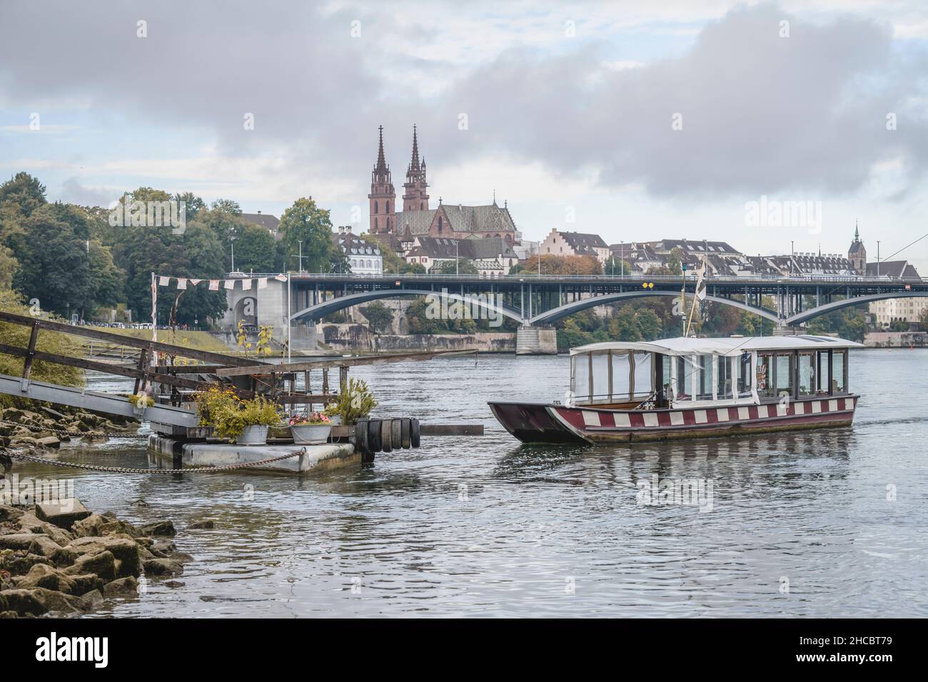 Switzerland, Basel-Stadt, Basel, Small ferry waiting on river Rhine ...