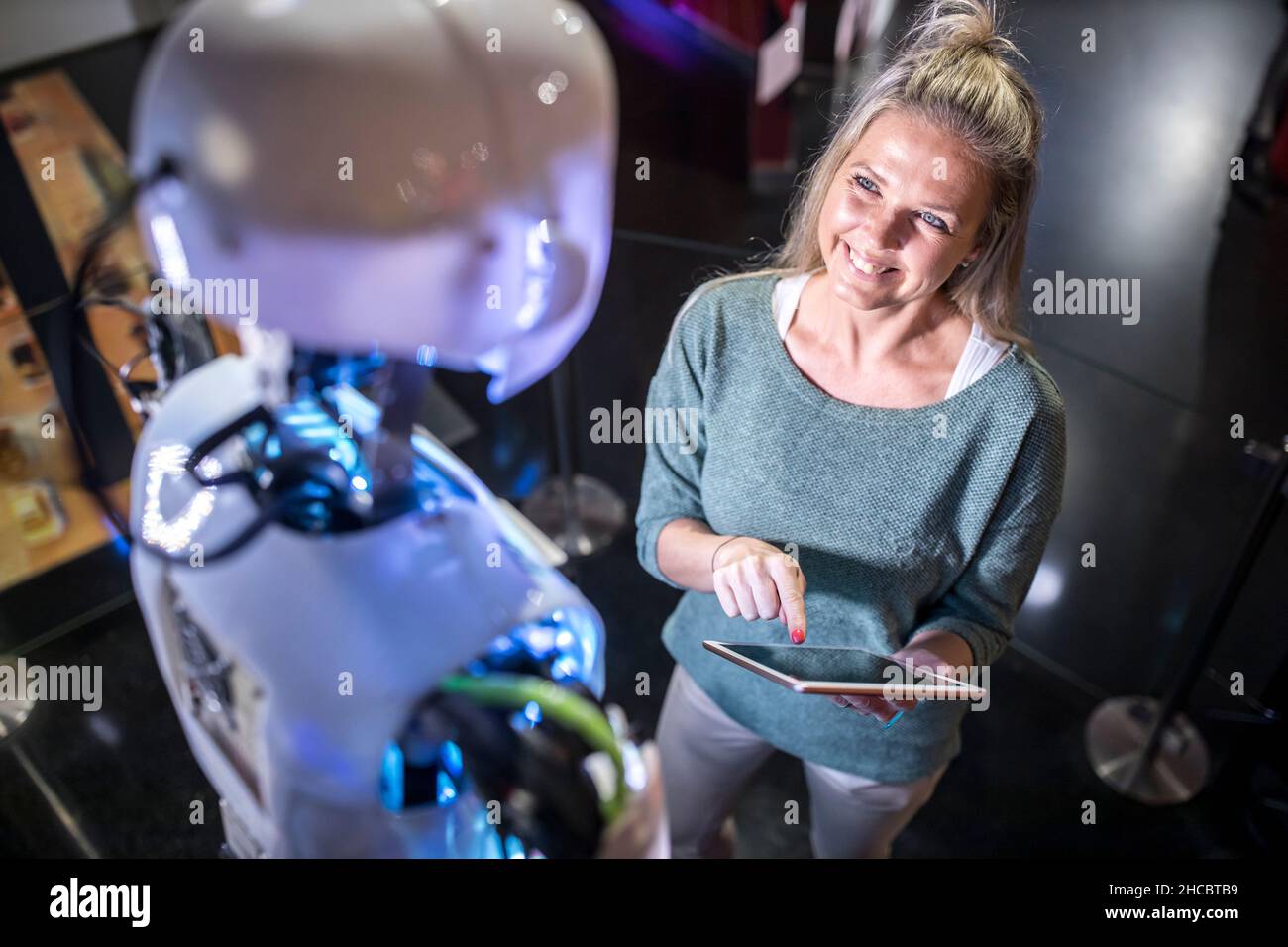 Smiling tech hi-res stock photography and images - Alamy