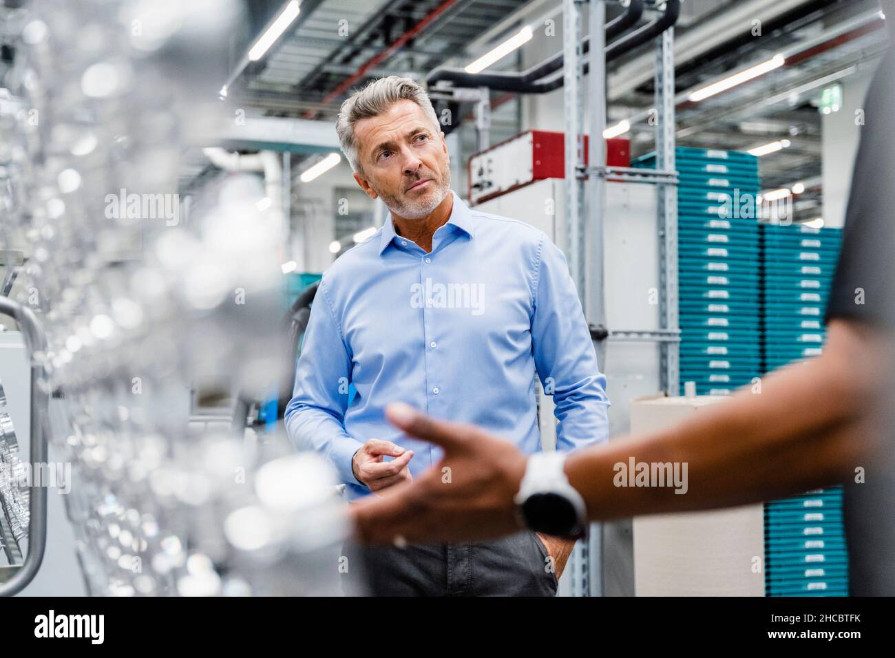 Businessman pointing modern building hi-res stock photography and ...