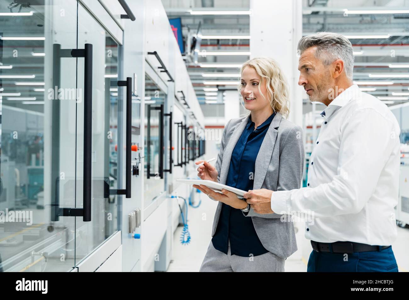 Female coworker working foreground hi-res stock photography and images - Alamy