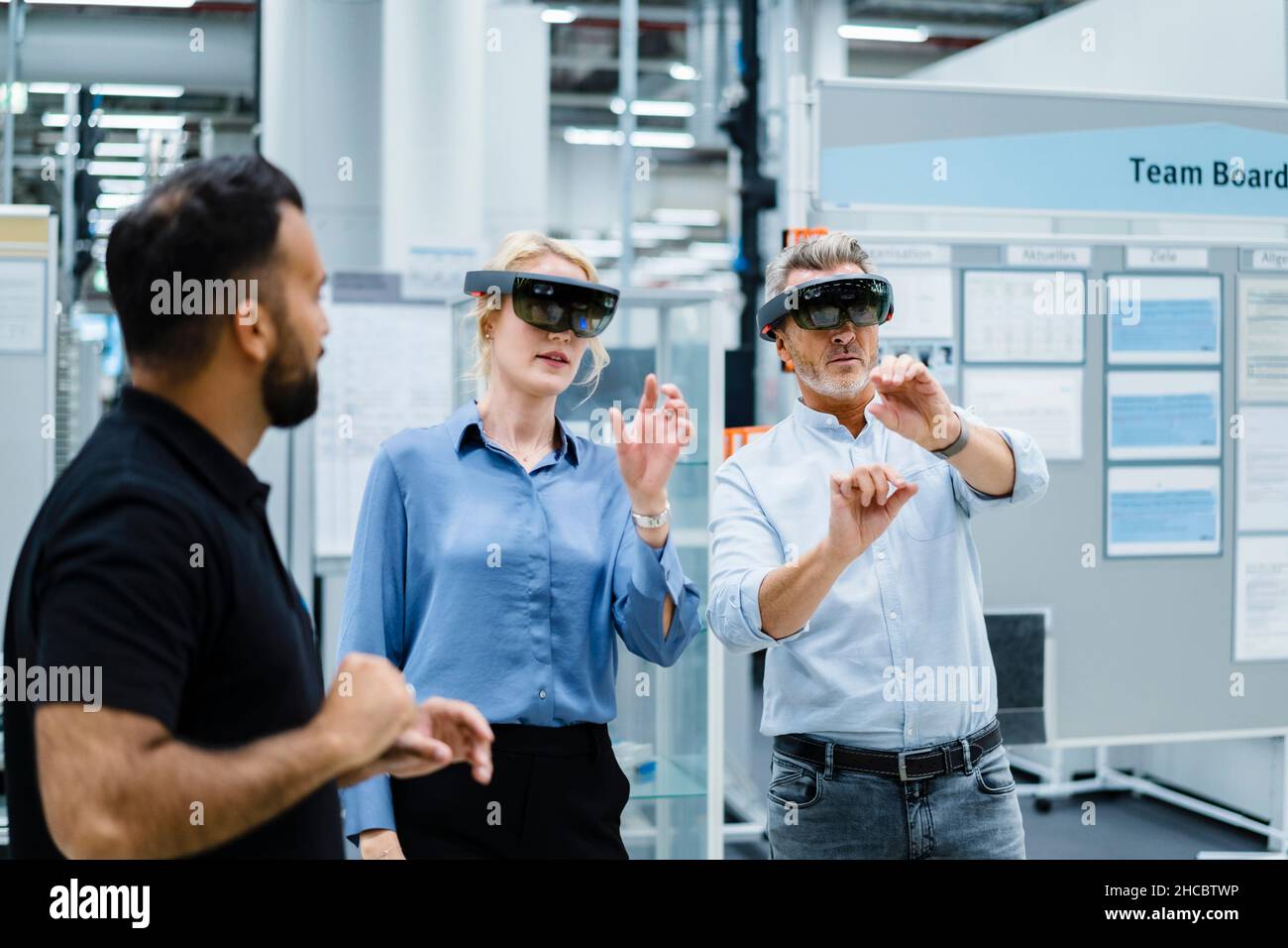 Technician using augmented reality hi-res stock photography and images ...