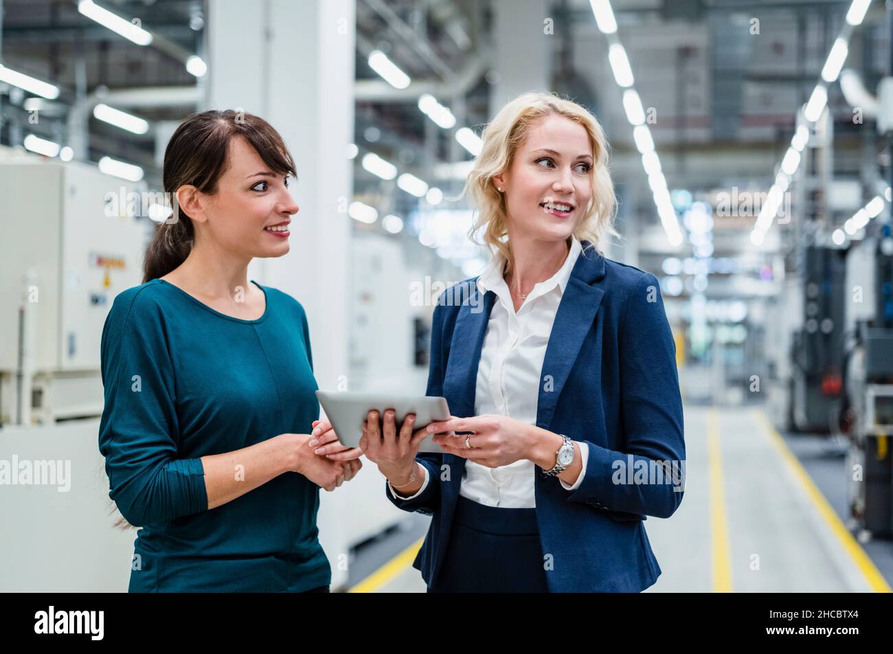 Standing smiling communication looking away authority hi-res stock ...