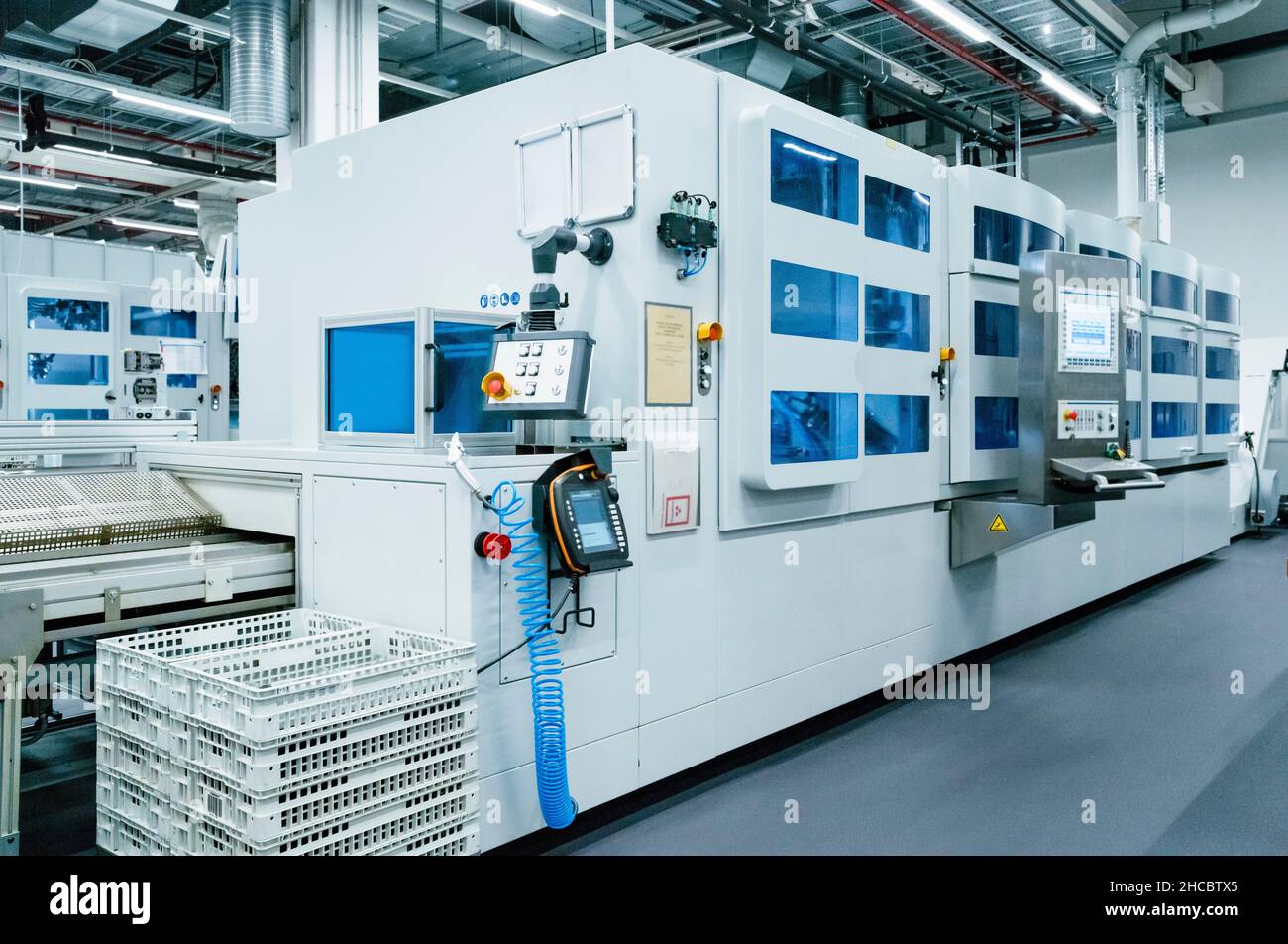 Automated machine at electrical industry Stock Photo - Alamy