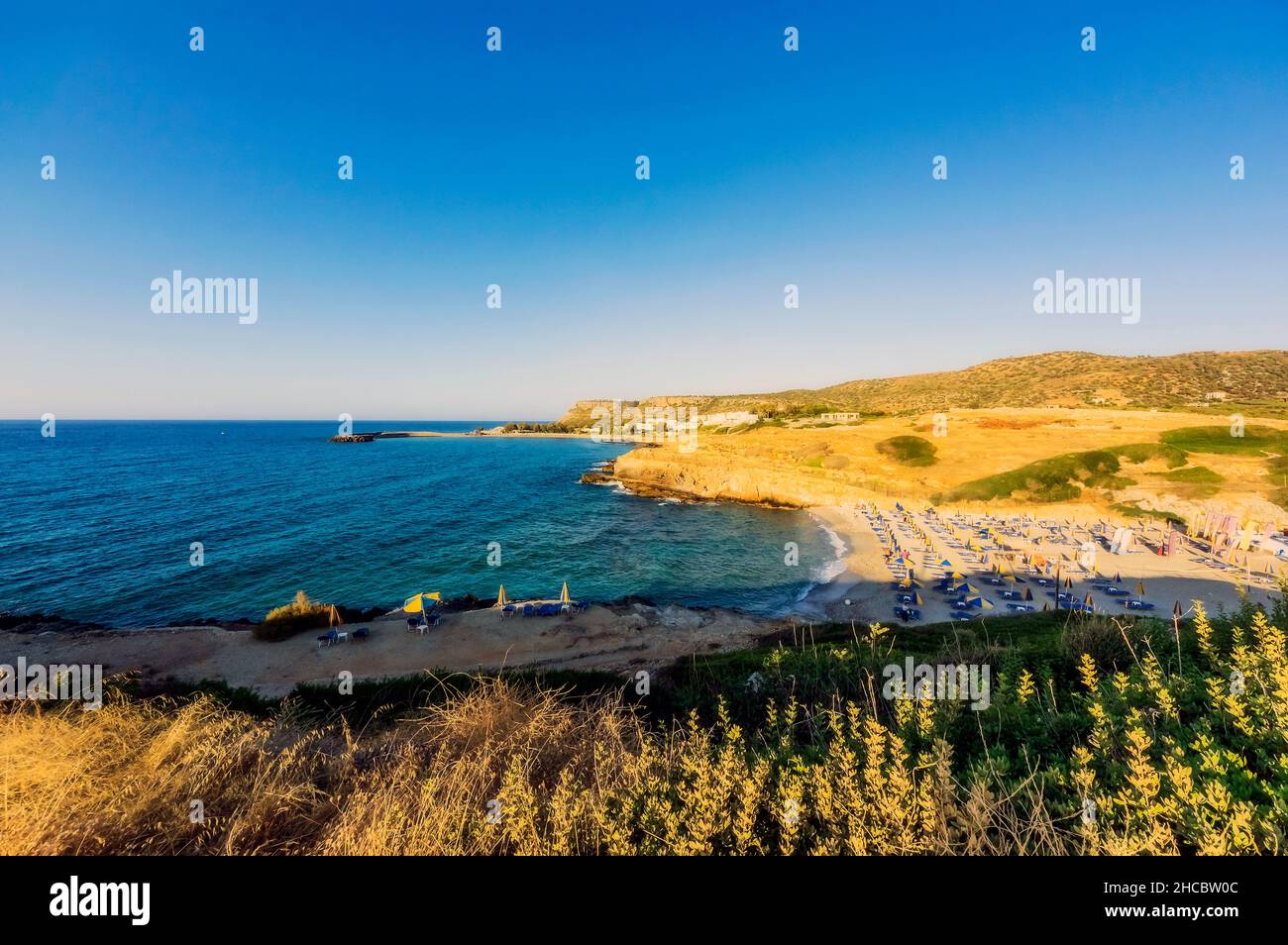 Greece, Crete, Sissi, Clear sky over coastal beach at early dusk Stock ...