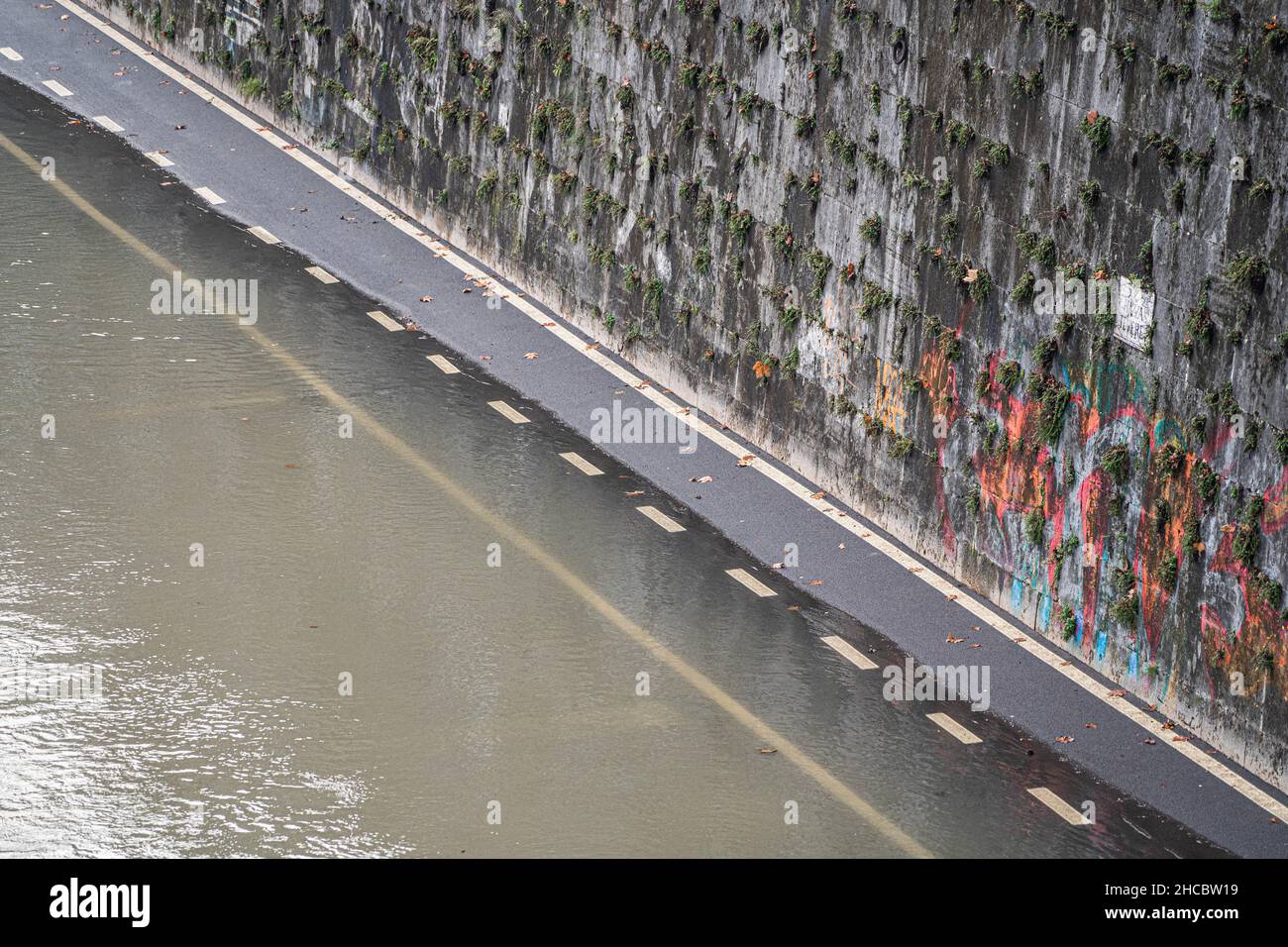 ROME, ITALY. 27 December 2021. A cycle lane is flooded as water levels ...