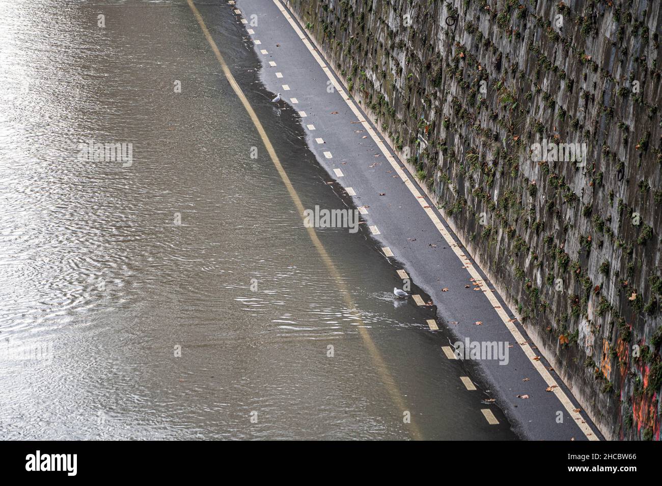 ROME, ITALY. 27 December 2021. A cycle lane is flooded as water levels ...