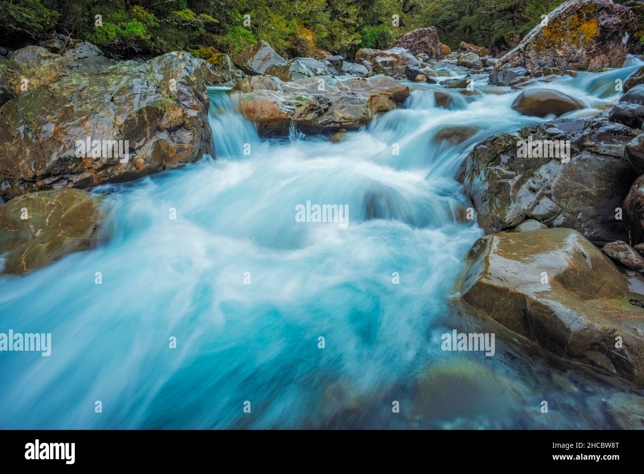 Long exposure of Bealey River flowing through Arthurs Pass Stock Photo ...
