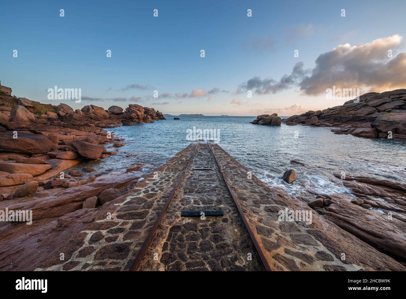Stone slipway at Cote de Granit Rose Stock Photo - Alamy