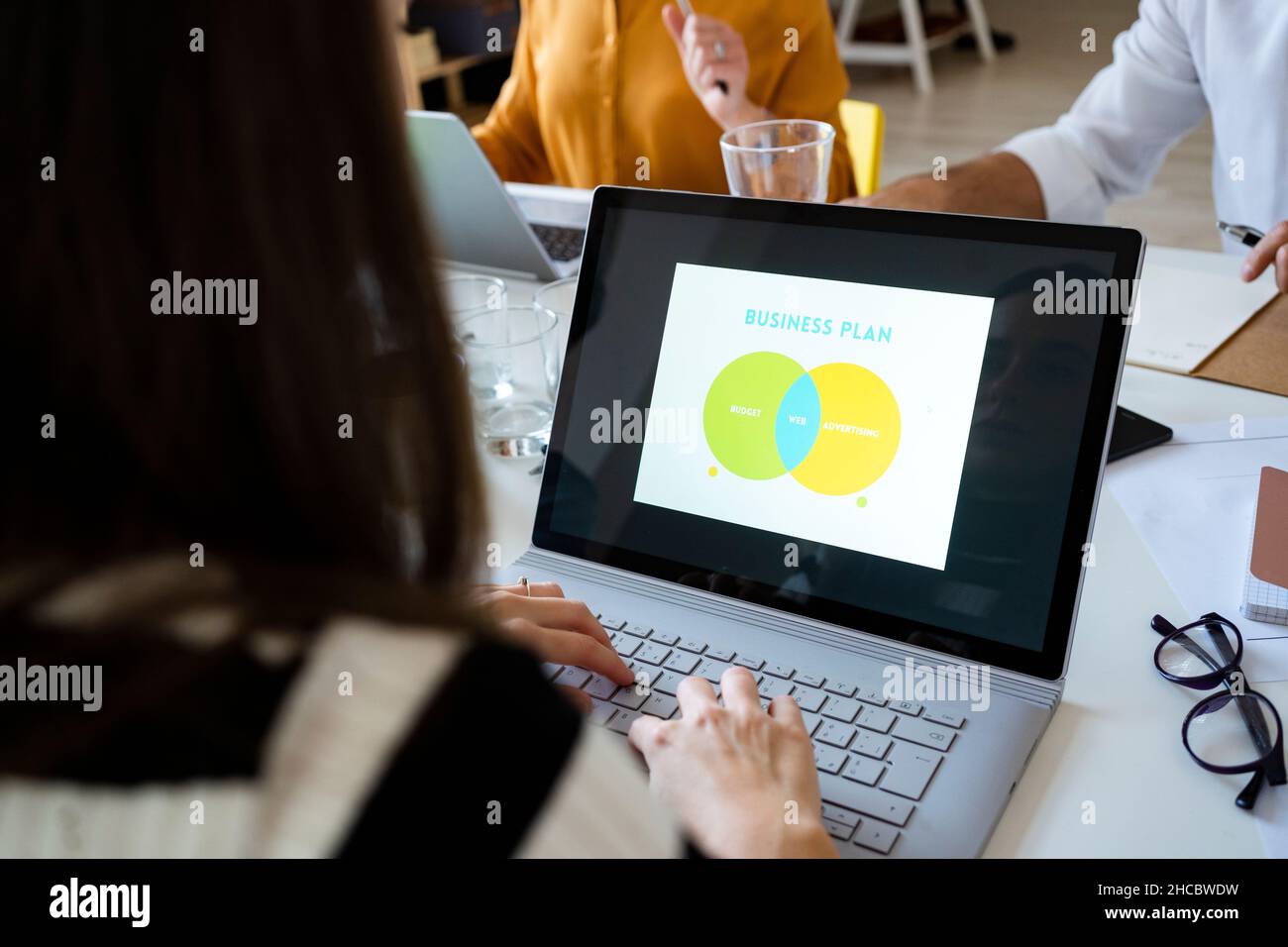 Businessman reading mind map presentation on tablet PC at office Stock ...