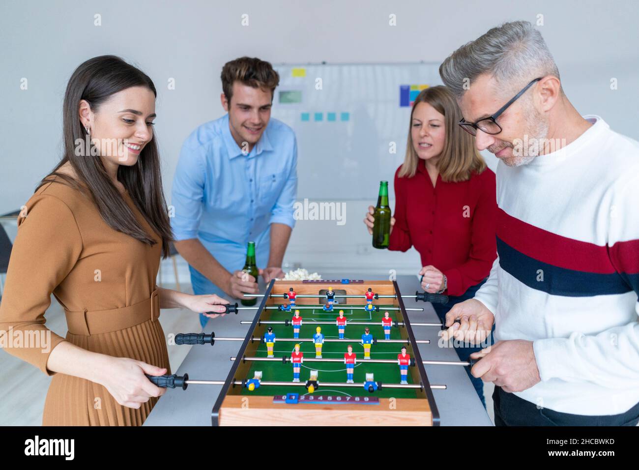 Playing table football in office hi-res stock photography and images ...