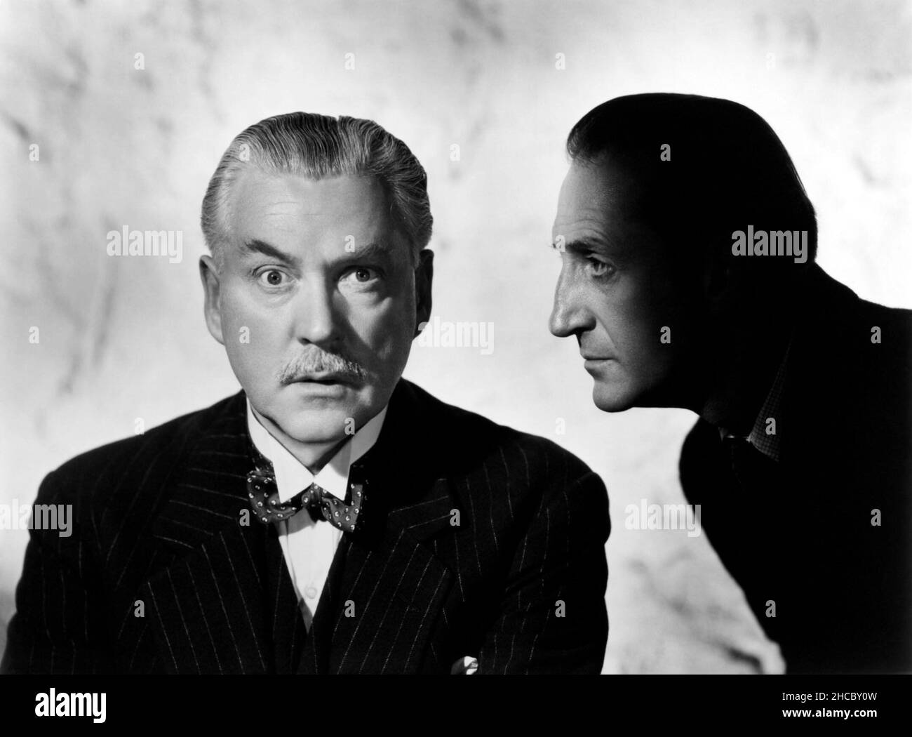 BASIL RATHBONE and NIGEL BRUCE in THE ADVENTURES OF SHERLOCK HOLMES ...