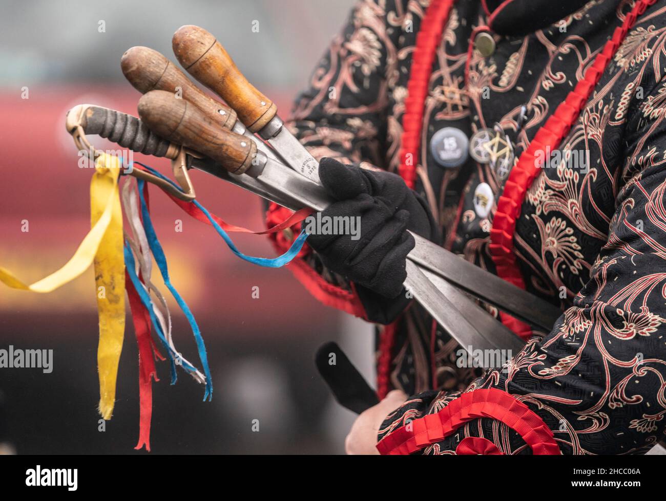 Sword are held by a member of the Grenoside Sword Dancers ahead of ...