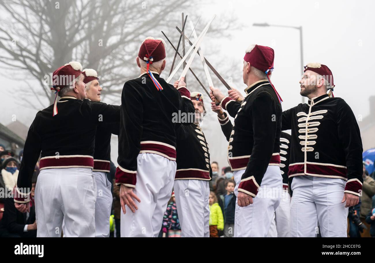 Members of the Handsworth Traditional Sword Dancers perform in Grenosid ...
