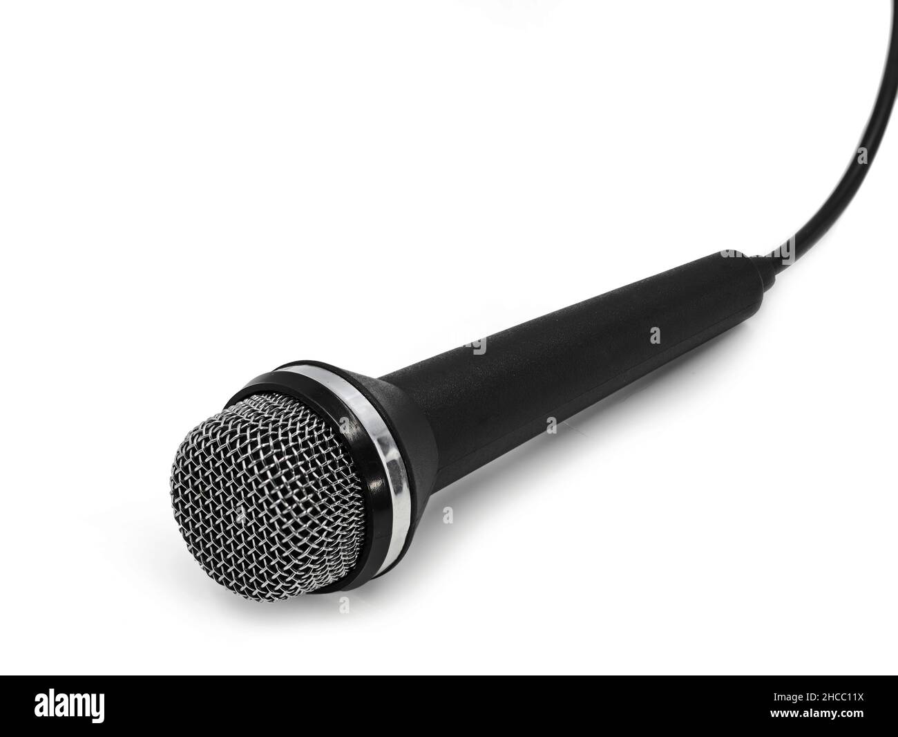 black microphone with cable isolated on white background Stock Photo ...