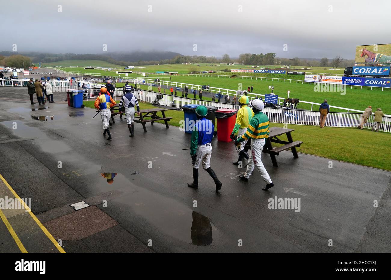 Jockeys make their way to the parade ring before the Coral "Fail To ...