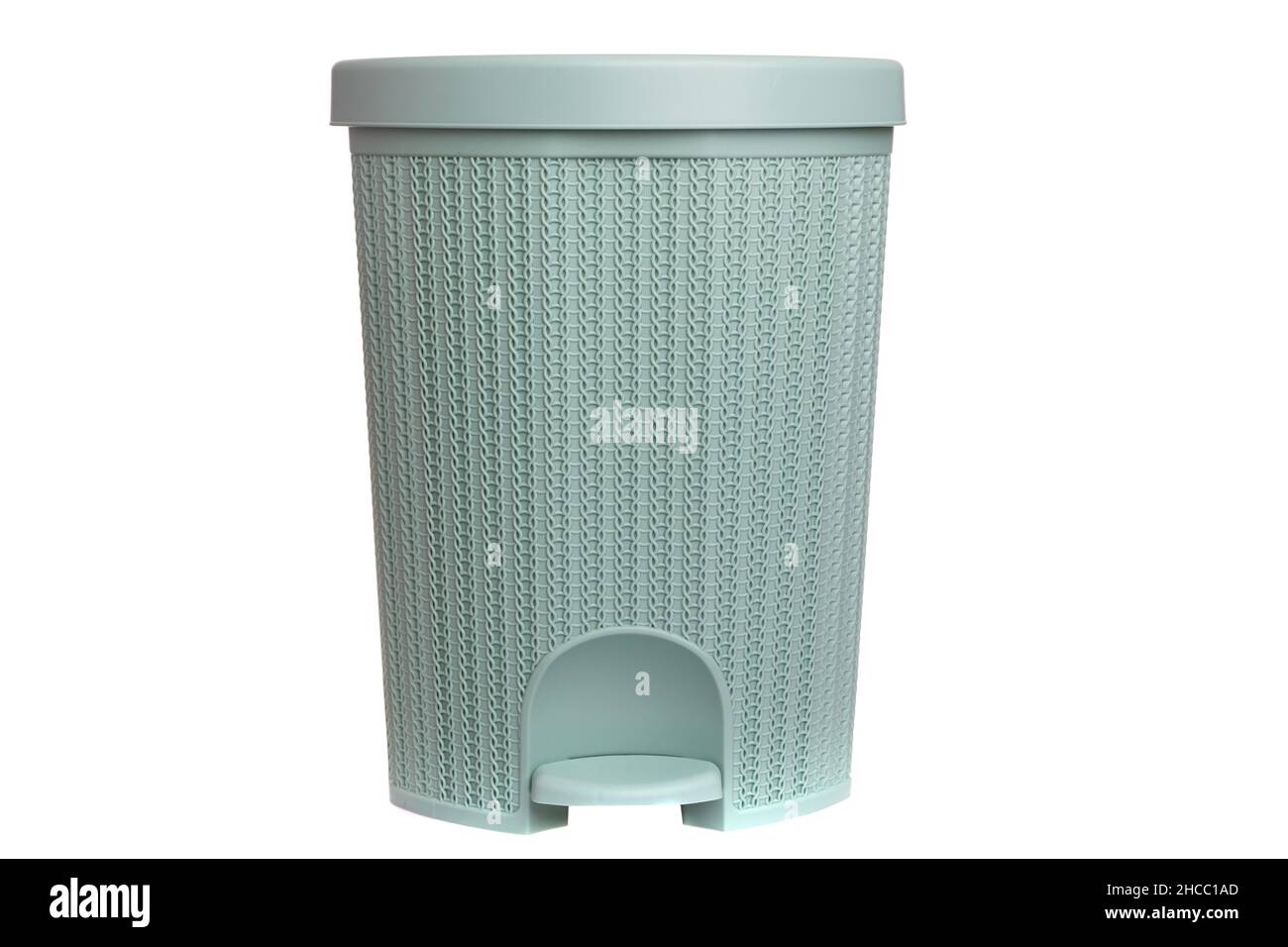 trash can of light green color with a pedal for opening on a white ...
