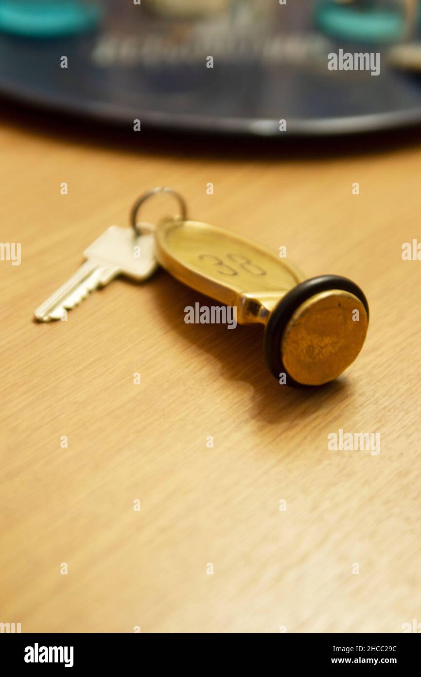 Old fashioned hotel key hi-res stock photography and images - Alamy
