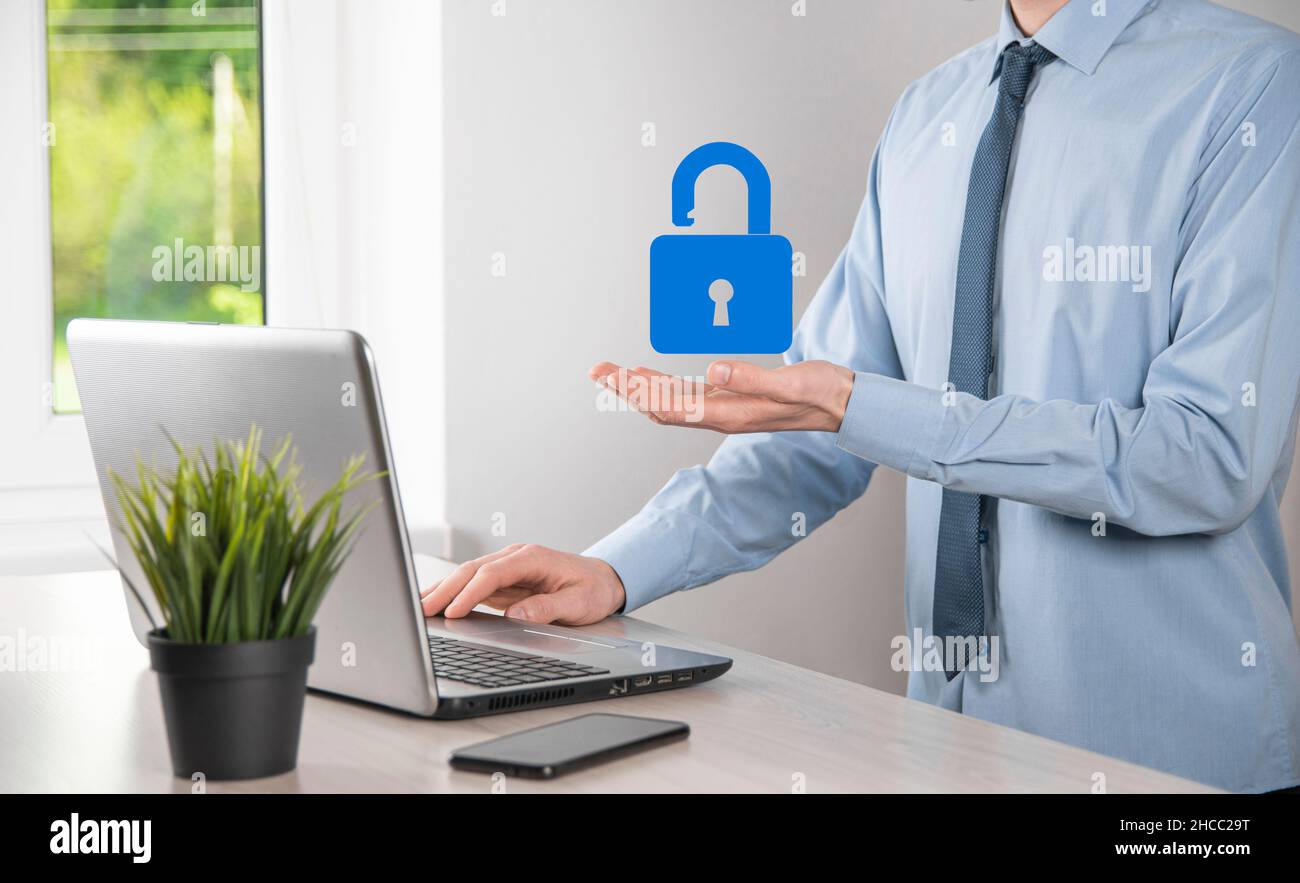 Male hand holding a lock padlock icon.Cyber security network. Internet ...