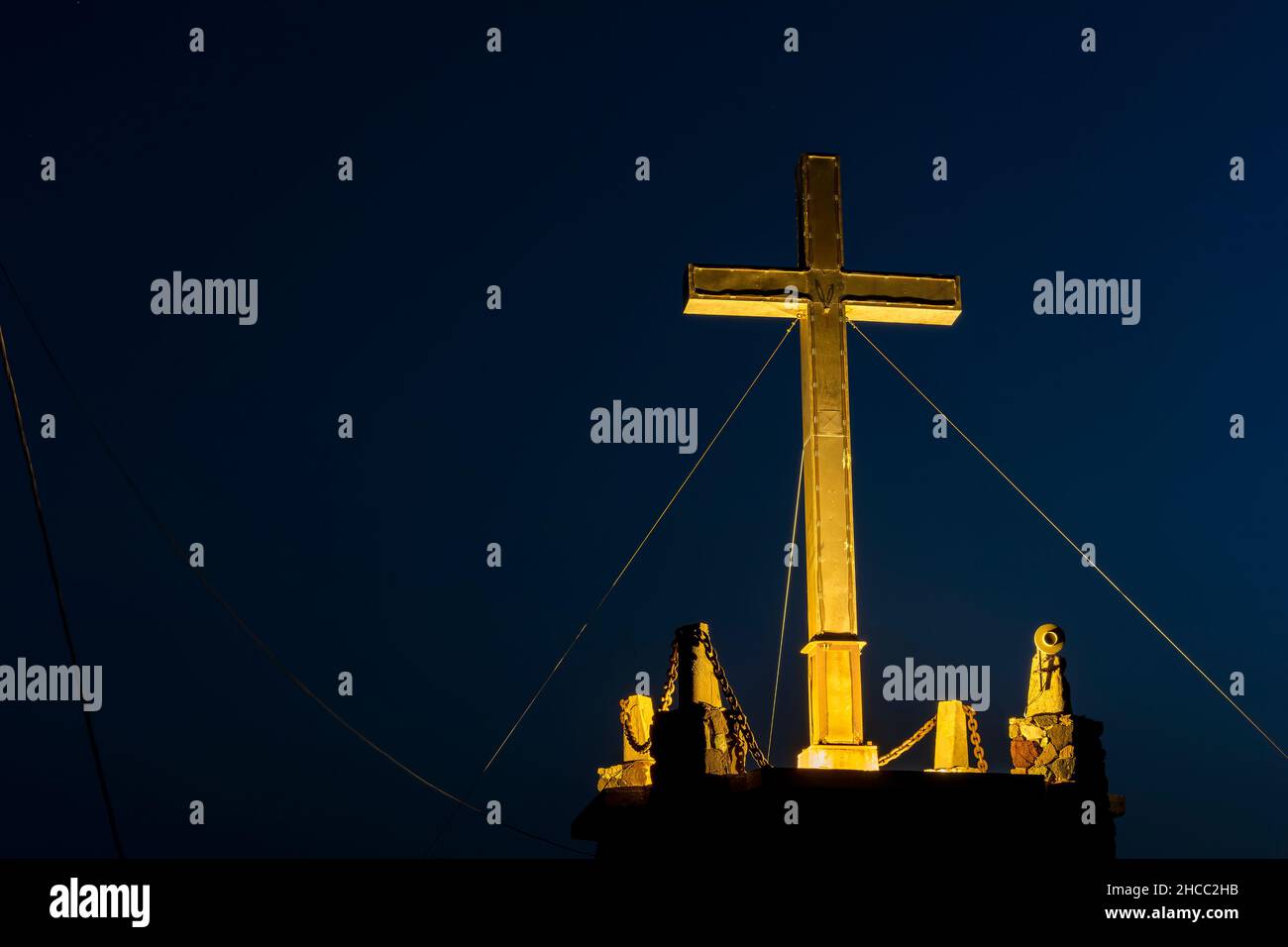 Large metal cross, 7 meters high, on a rock above the Monastery of ...