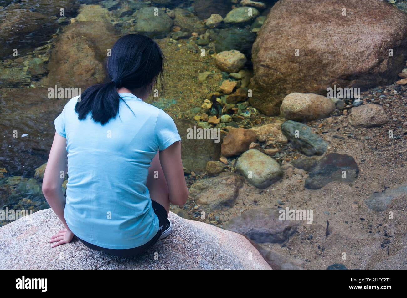 Woman squatting down hi-res stock photography and images - Alamy