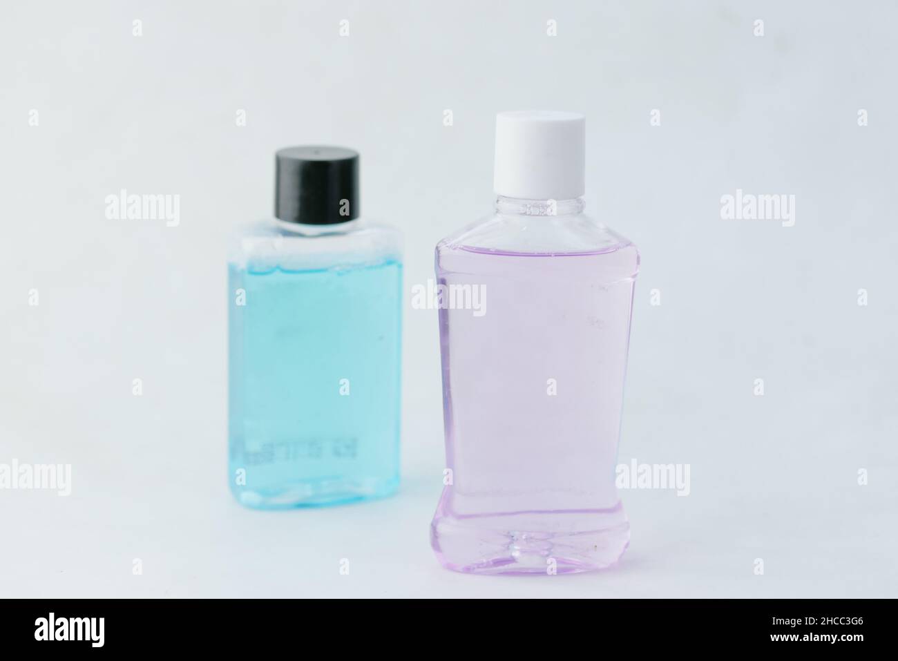 mouthwash liquid in a container on table Stock Photo - Alamy