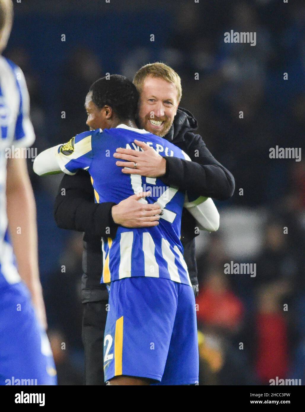 Brighton head coach Graham Potter hugs Enock Mwepu after the win during ...