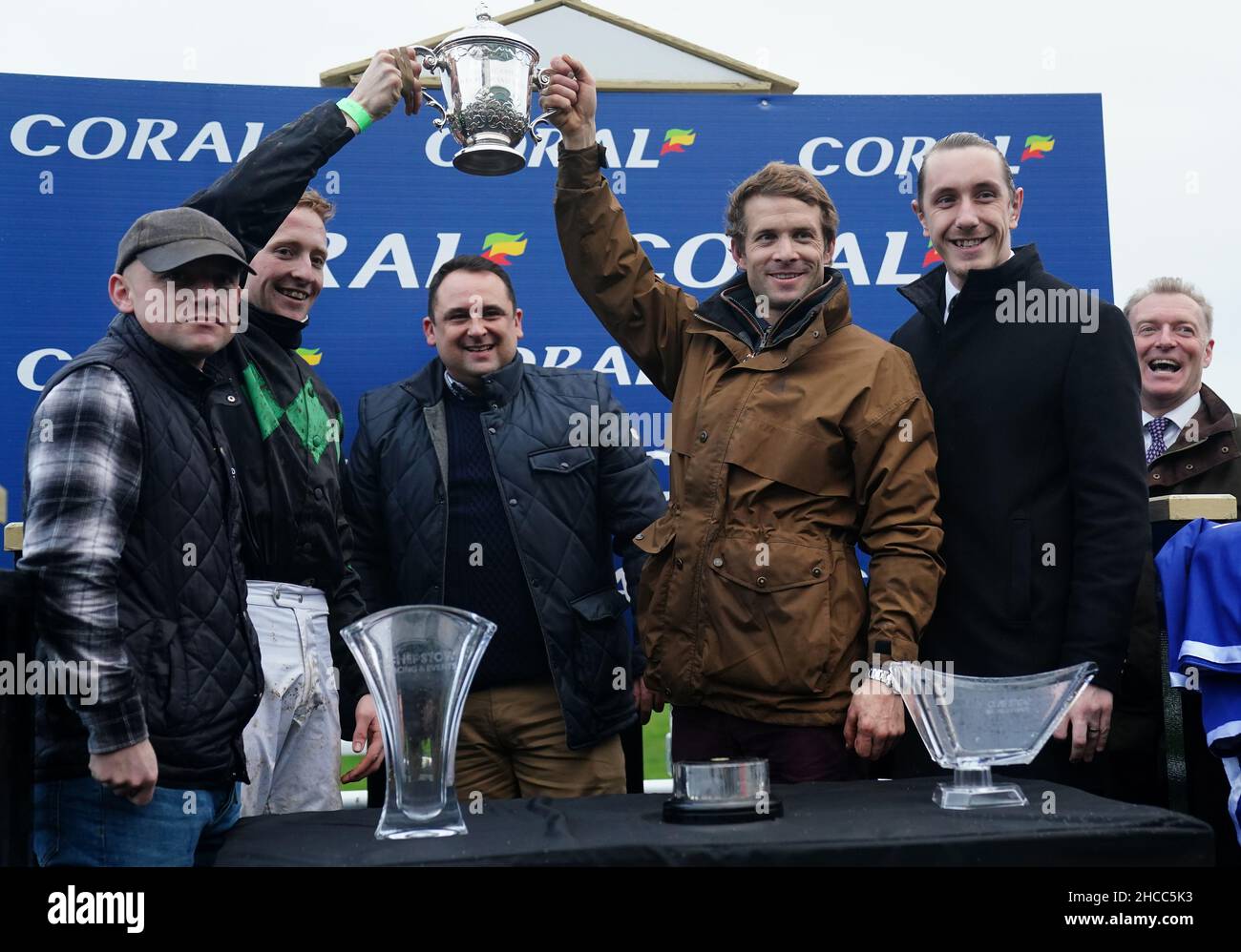 Winning jockey Stan Sheppard (second left) and trainer Sam Thomas ...