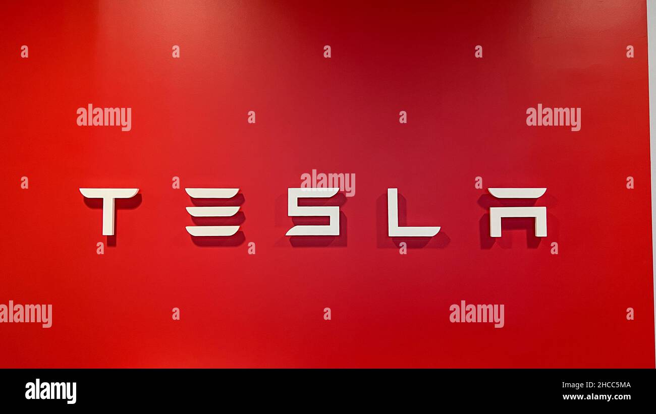 Orlando, FL USA - November 5, 2021: The Tesla Sign at the entrance of ...