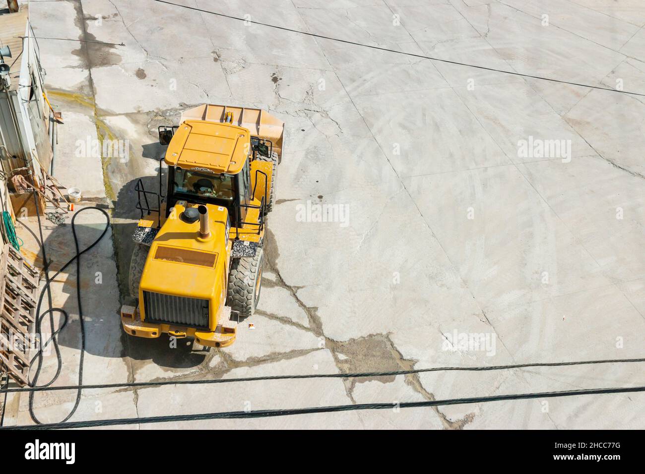 CAT Caterpillar wheeled loader earth mover shot from above with copy ...