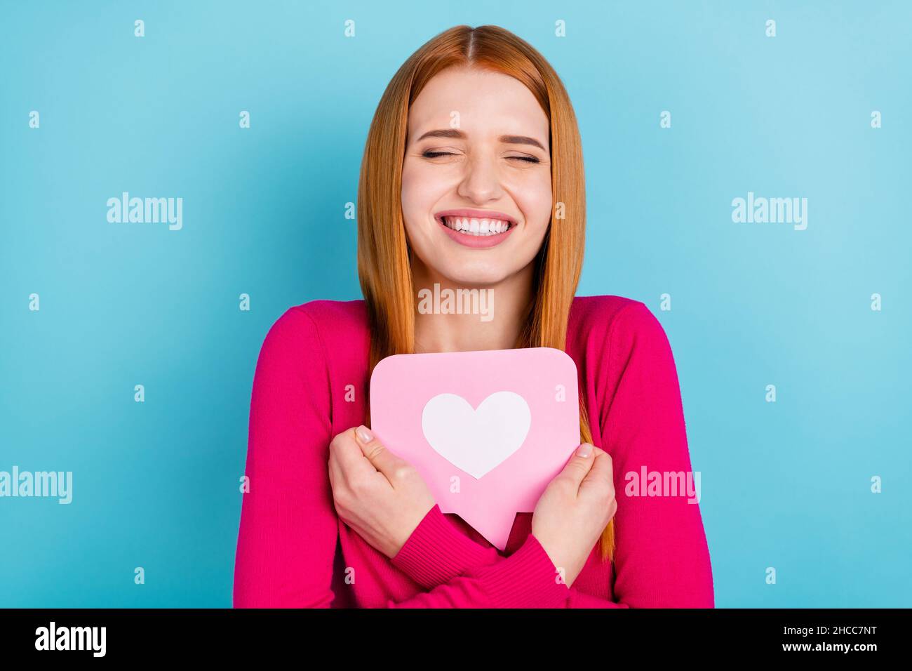 Portrait of attractive dreamy cheerful girl hugging like paper card ...