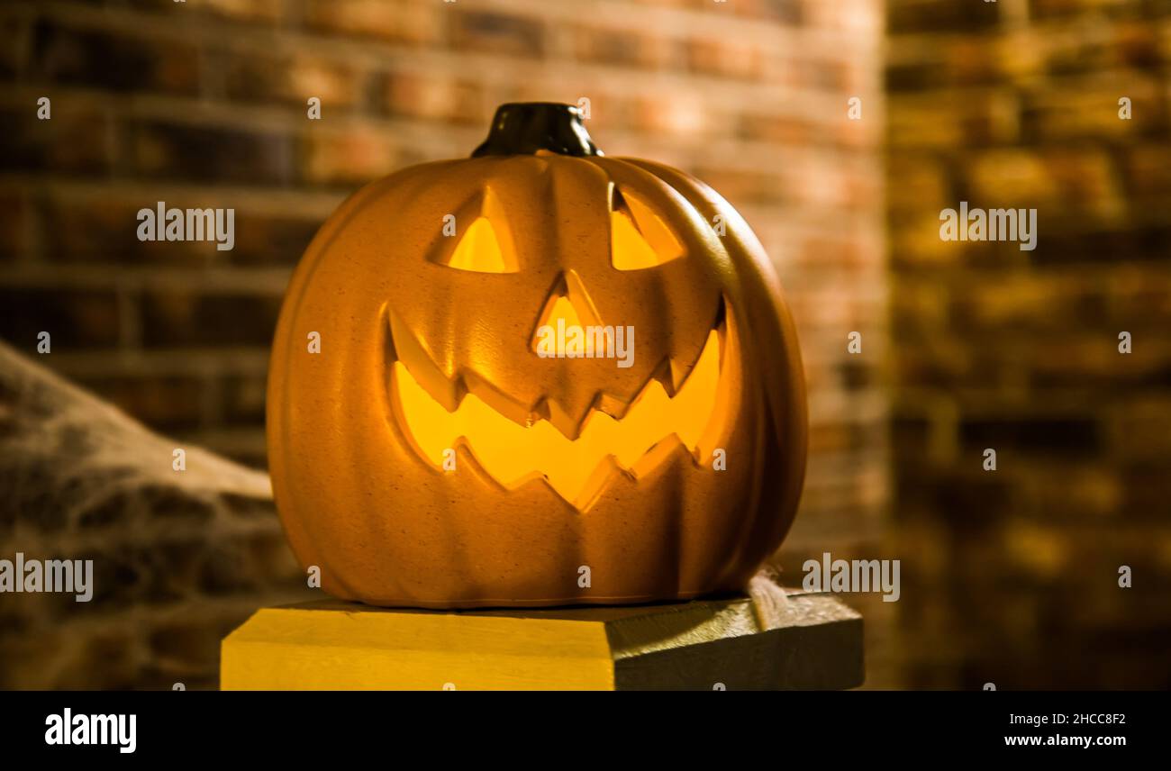 Orange carved Halloween pumpkin Stock Photo - Alamy