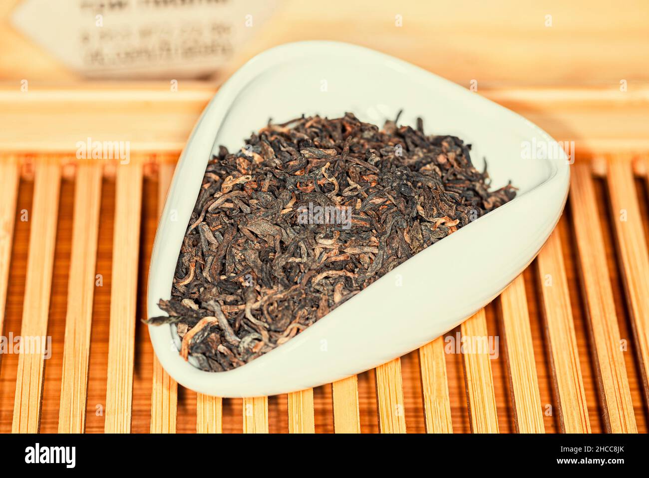 Chinese bulk extruded tea ripe Puer in tea presentation vessel Stock ...