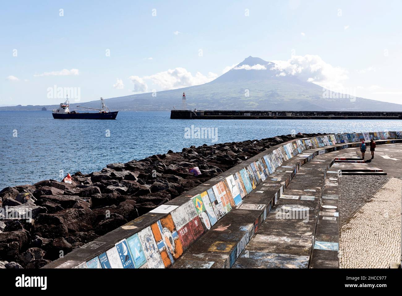 Painted port wall with graffiti with mount Pico in the background ...