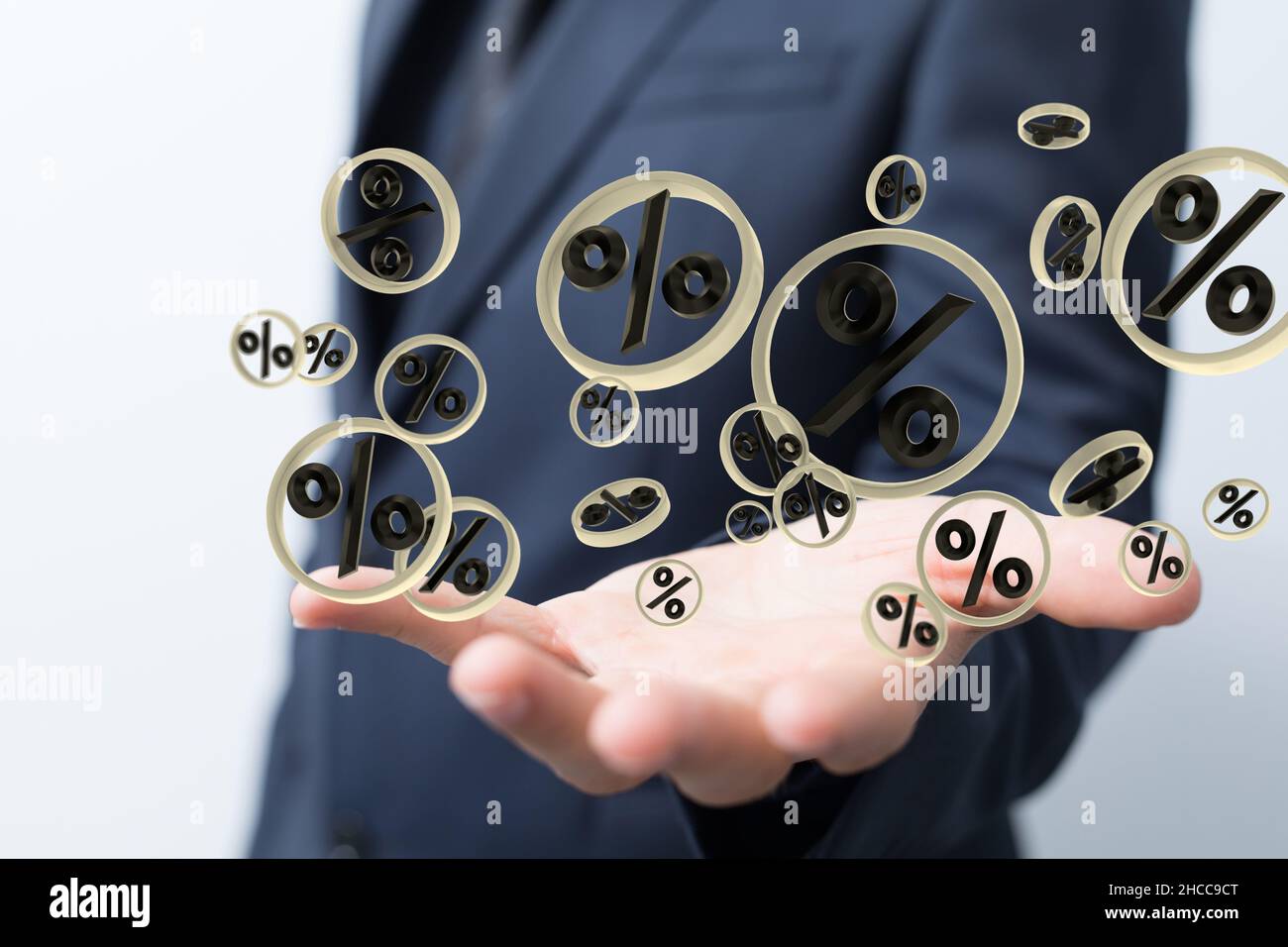 Closeup of the hand holding the floating percentage signs Stock Photo ...