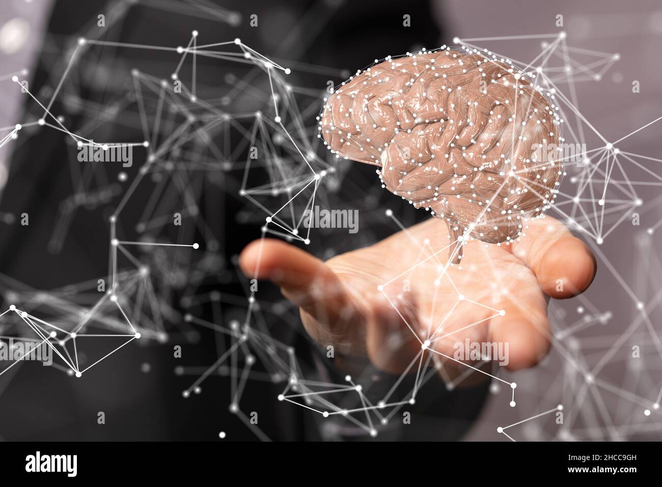 Closeup of the hand holding the virtual 3d model of the human brain ...