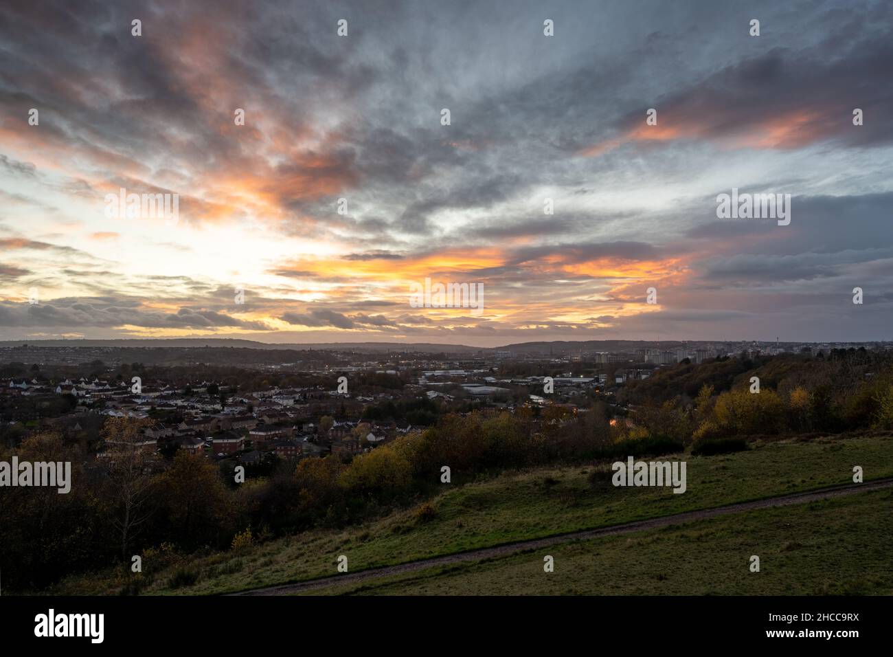 The sun sets over the cityscape of central and South Bristol, as viewed ...