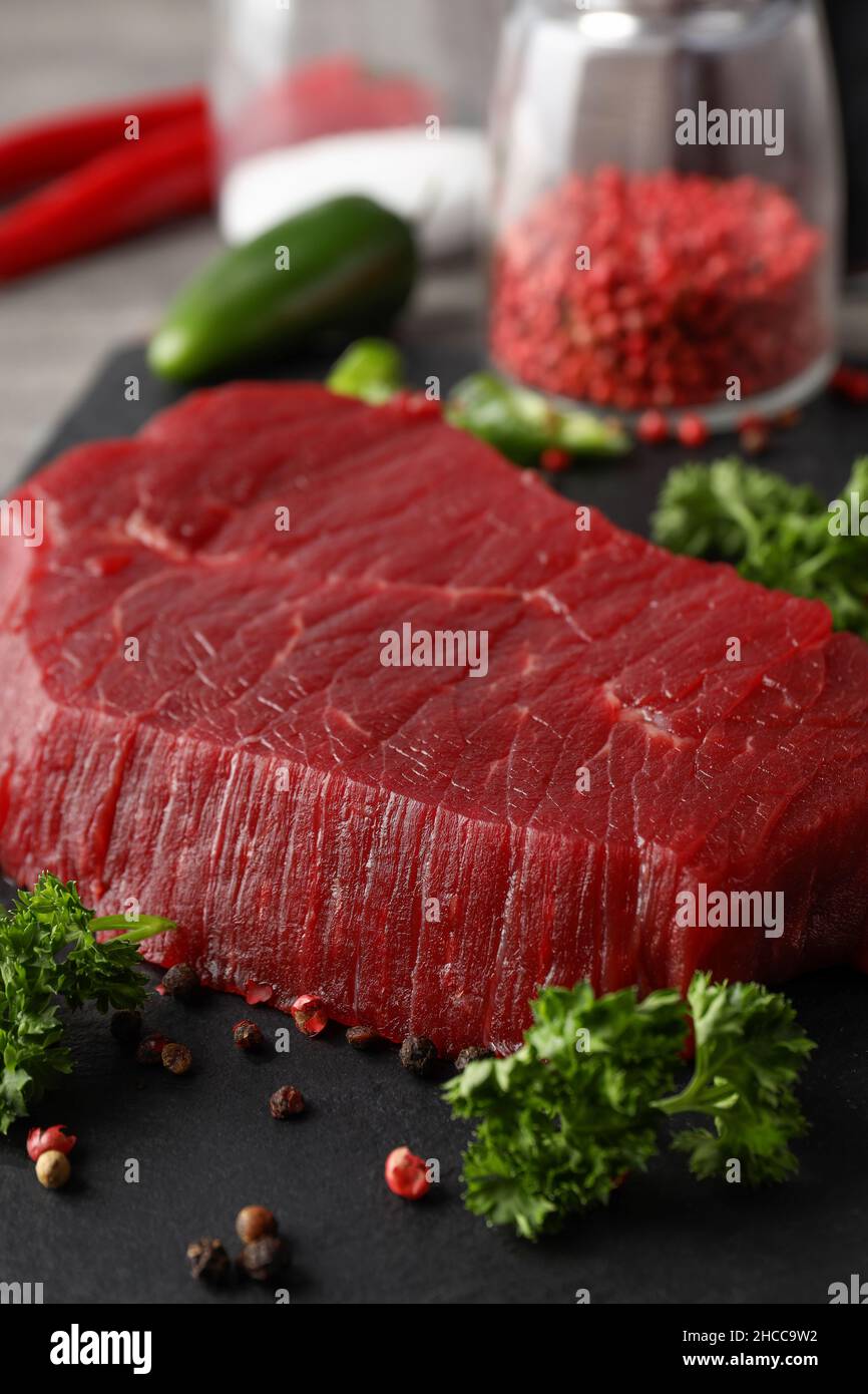 Concept of cooking with raw steak, close up Stock Photo - Alamy