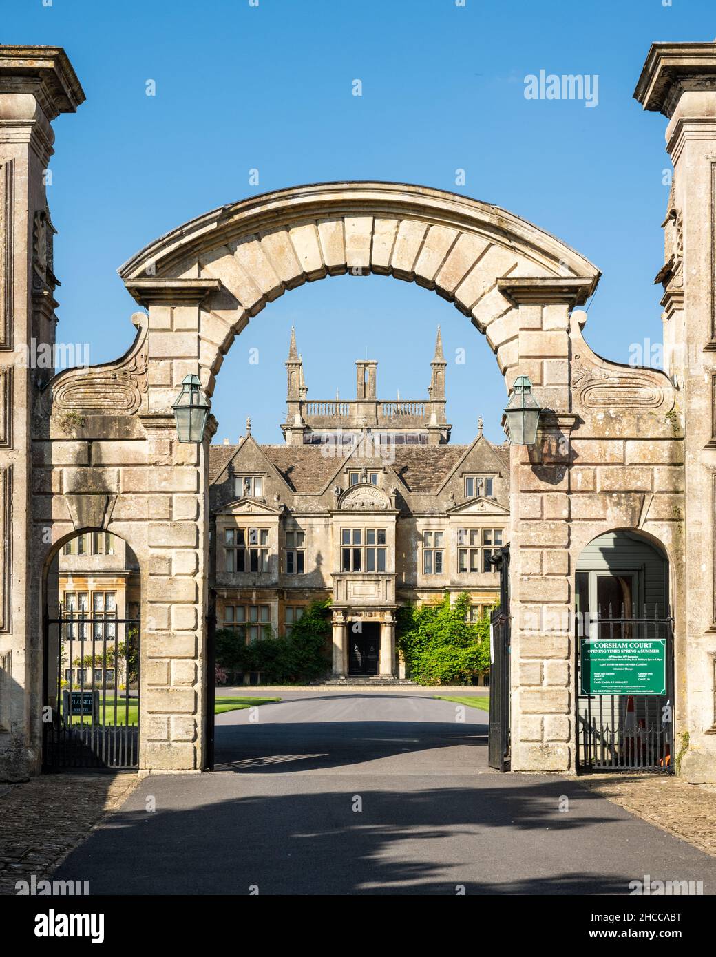 The Elizabethan manor house at Corsham Court is glimpsed through its ...