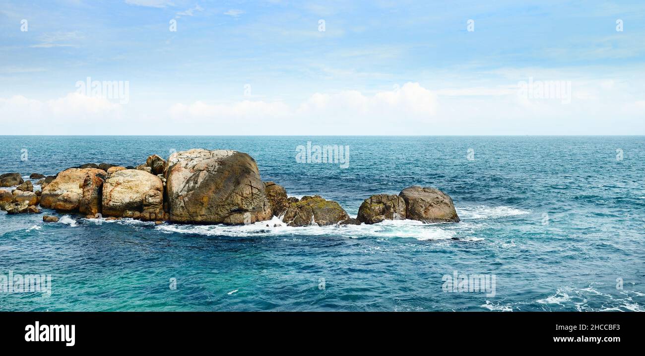 large rock in the ocean Stock Photo - Alamy