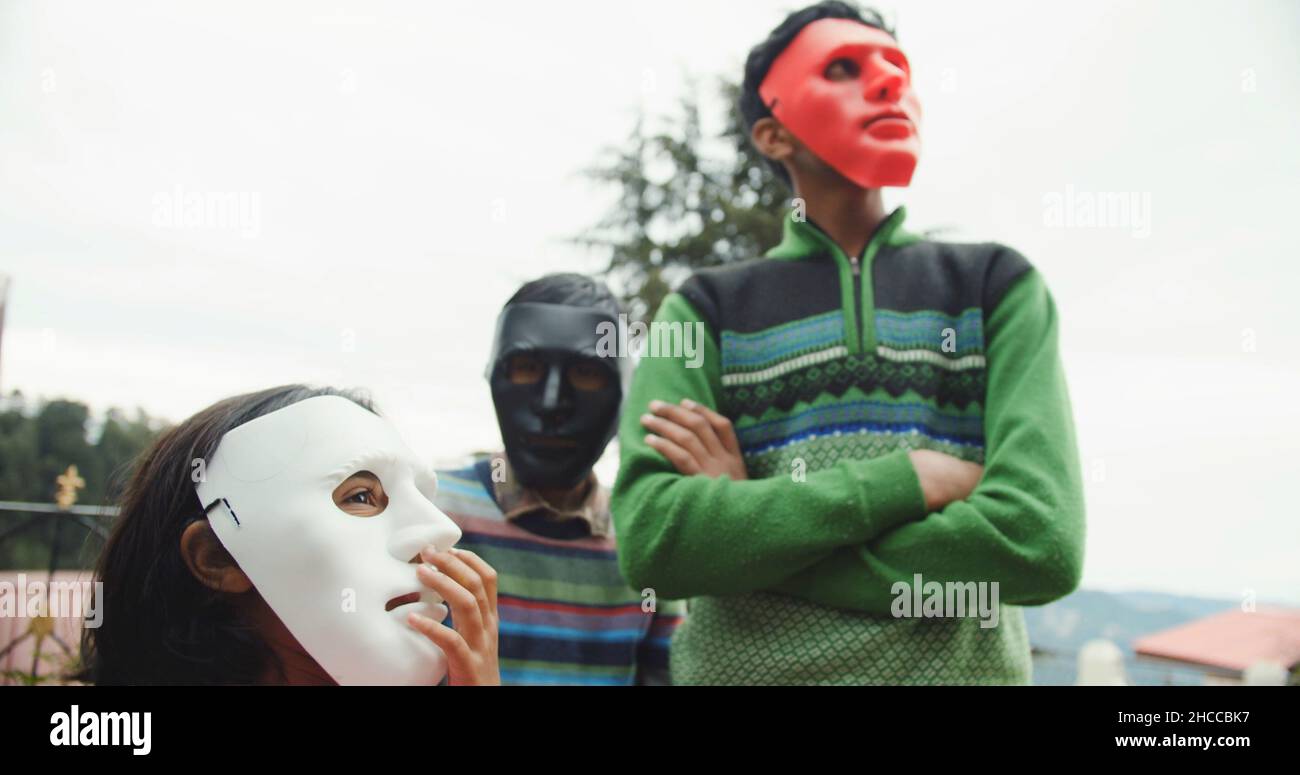 Group of young South Asian friends in scary masks in India Stock Photo ...