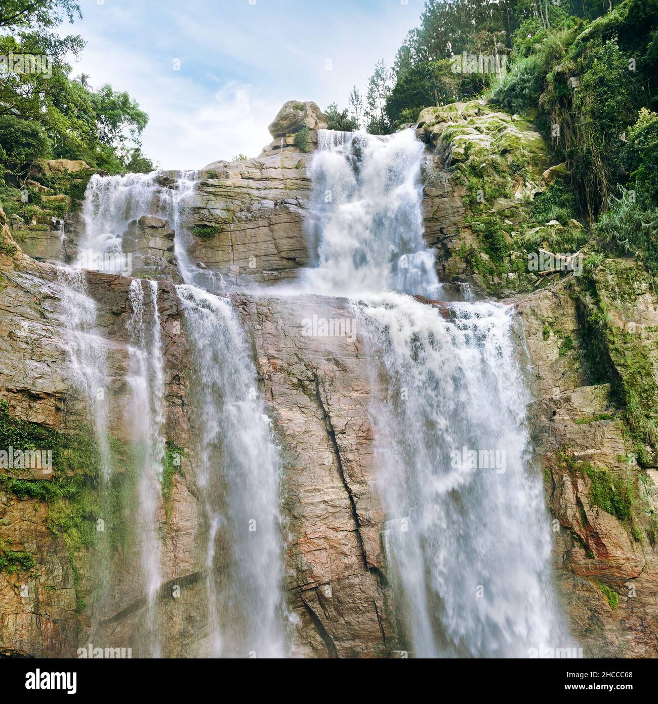 big waterfall in the forest Stock Photo - Alamy