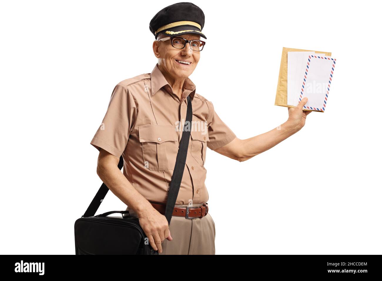 Cheerful mailman in a uniform holding letters and smiling isolated on ...