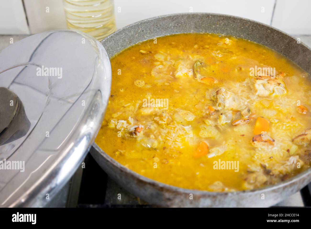 Ingredients for pilaf. Carrots, onion bulbs, rice, sliced meat, salt ...